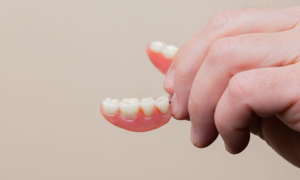 Your Guide to Dental Bridges vs. Partial Dentures - Northside Dental Co.